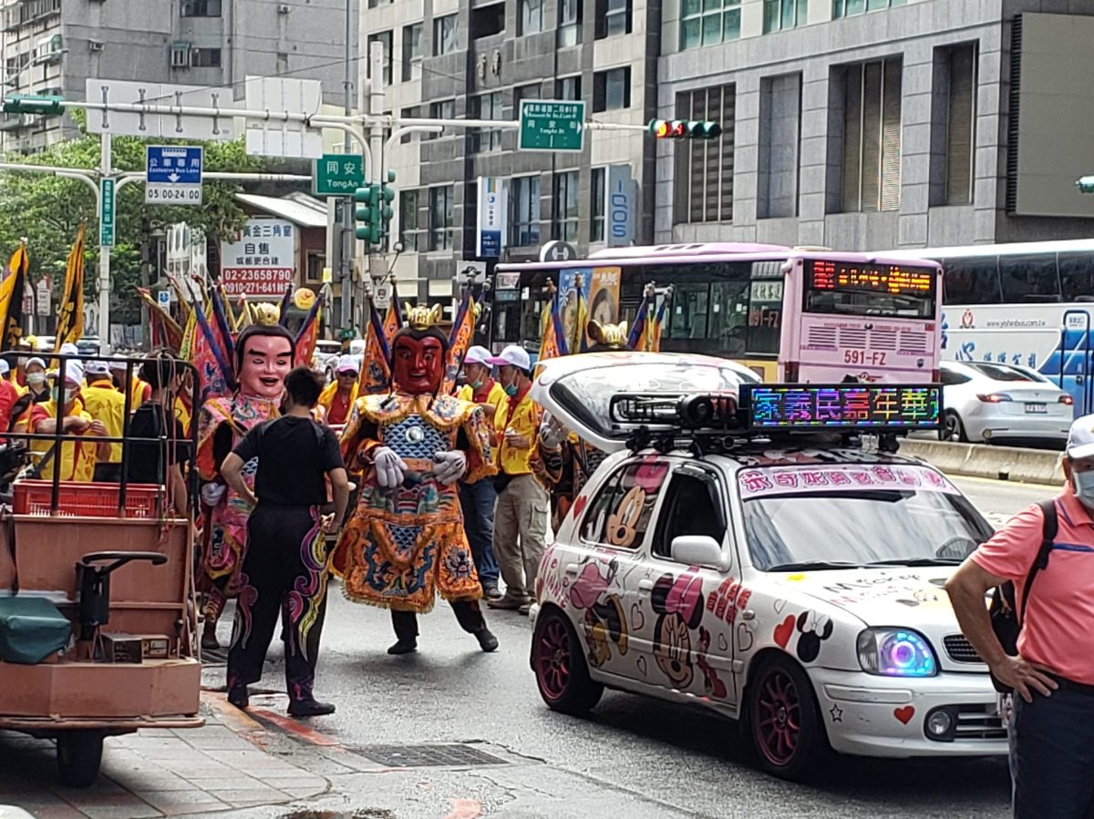 A Taiwanese Hakka temple festival parade (featuring Minnie Mouse ...